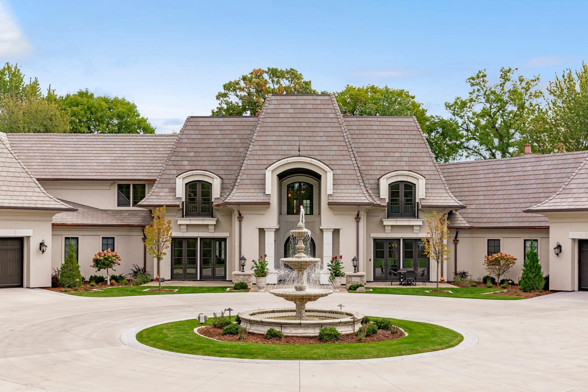 French Country Estate on Lake M - Swanson Homes Showcase